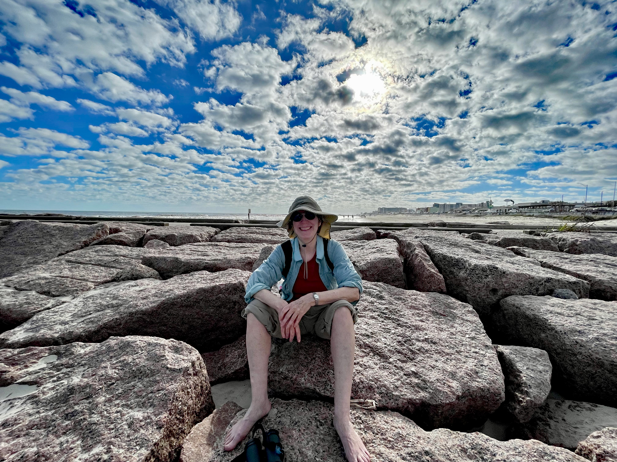 Anne Sitting on a Rocky Pier | RegenAxe